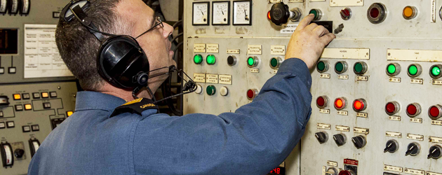 Mainting the Local Control Console (LCC) on HMCS Halifax